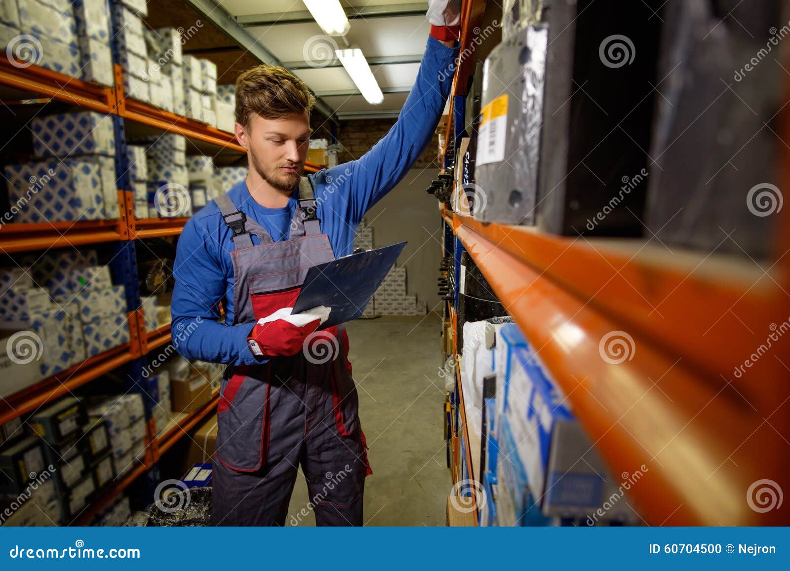 Worker in a Spare Parts Warehouse Stock Photo - Image of occupation ...