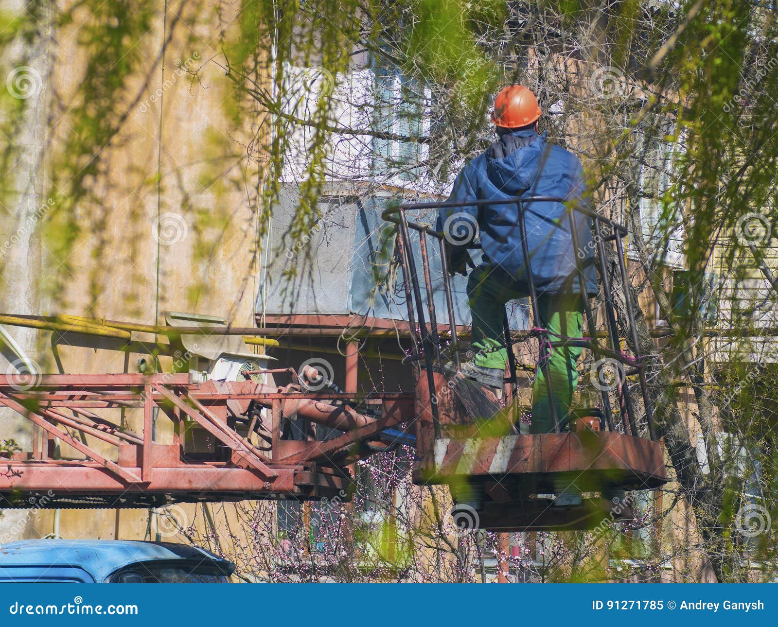 Worker in Special Clothes on Lift Machine Stock Image - Image of light ...