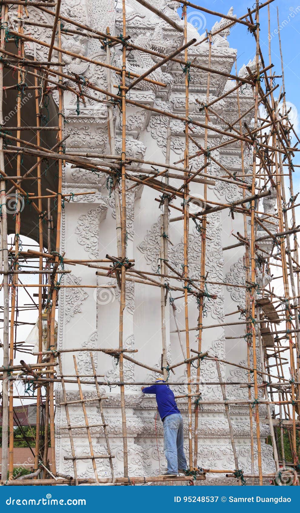 Worker is spraying paint. stock image. Image of framework - 95248537