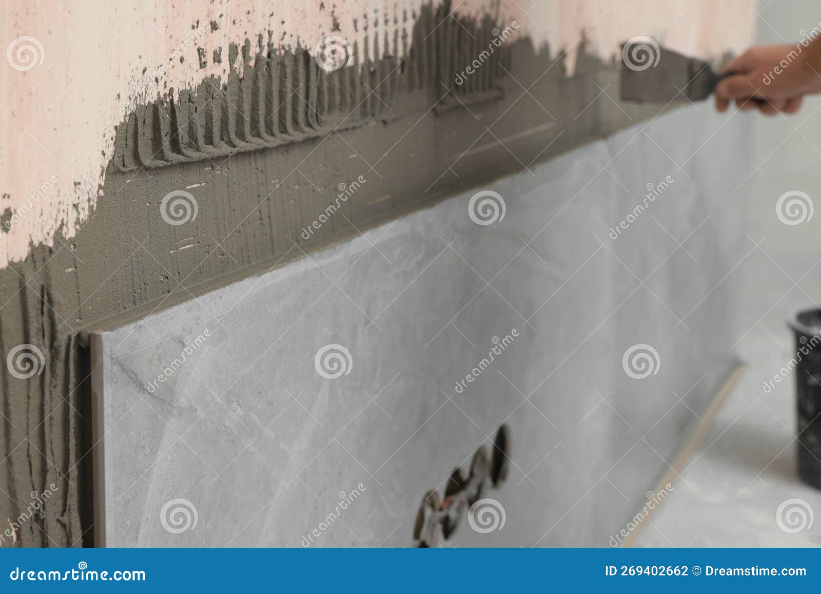 Worker Spreading Adhesive Mix on Wall, Closeup. Tiles Installation ...