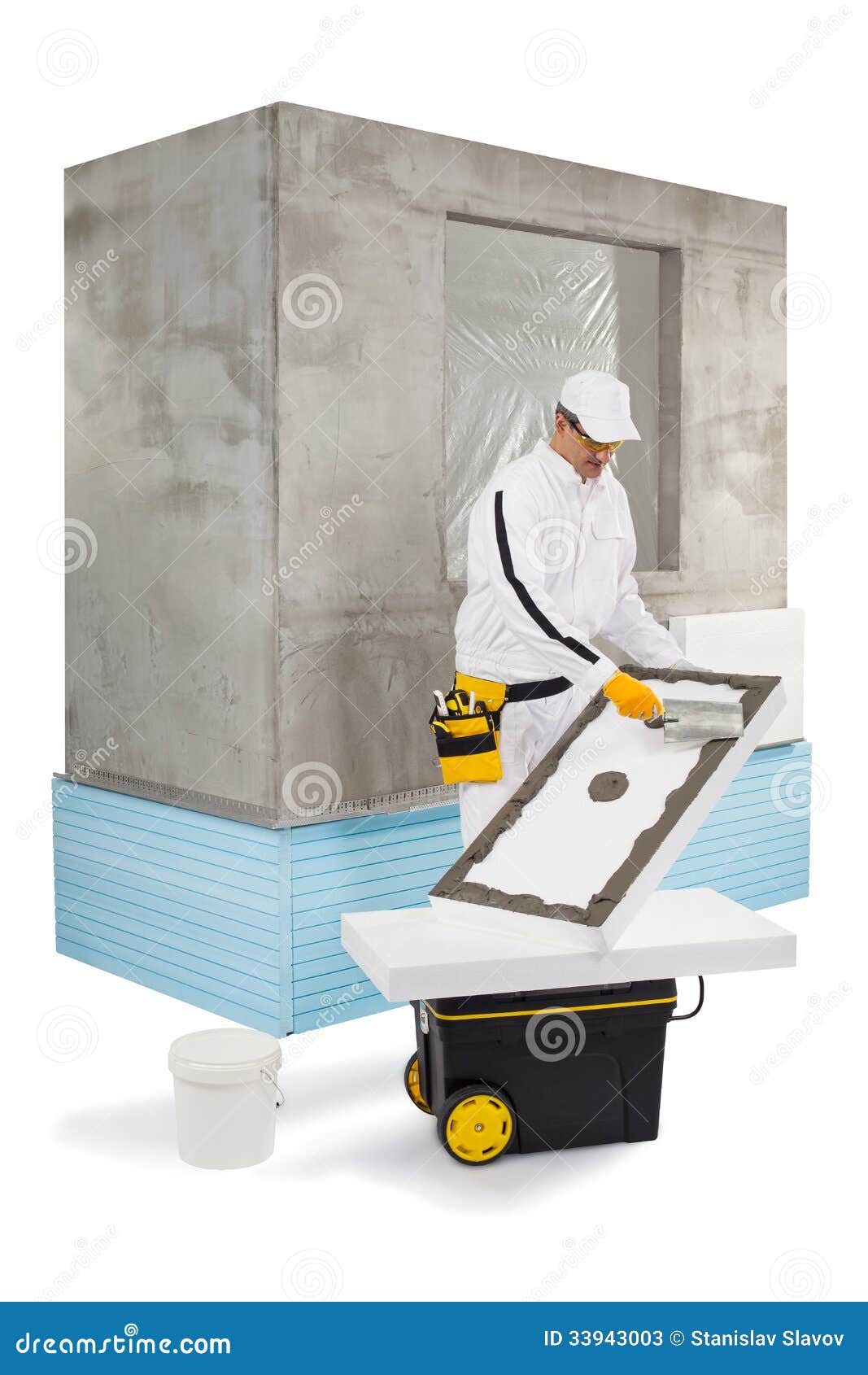 Worker spreading a putty stock image. Image of building - 33943003