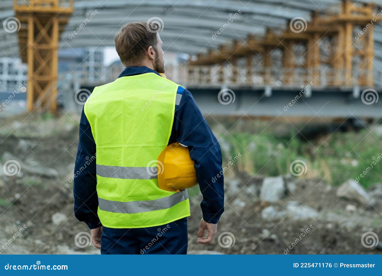 Worker Standing on Construction Site Stock Photo - Image of looking ...