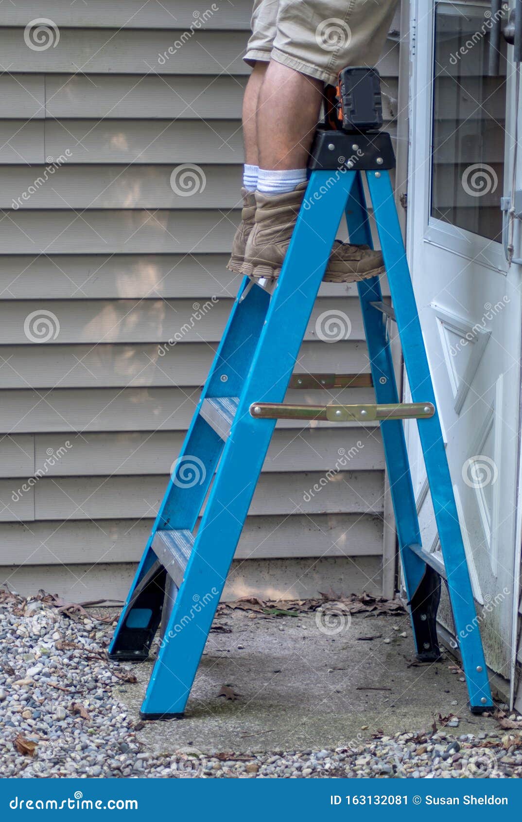 Worker Standing on a Ladder Stock Image - Image of door, collar: 163132081
