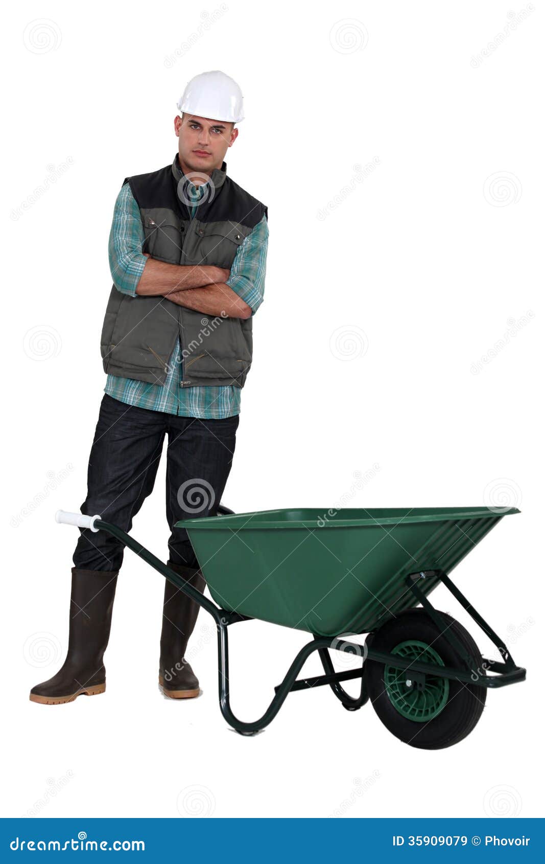 Worker Standing by a Wheelbarrow. Stock Image - Image of gray, jeans ...