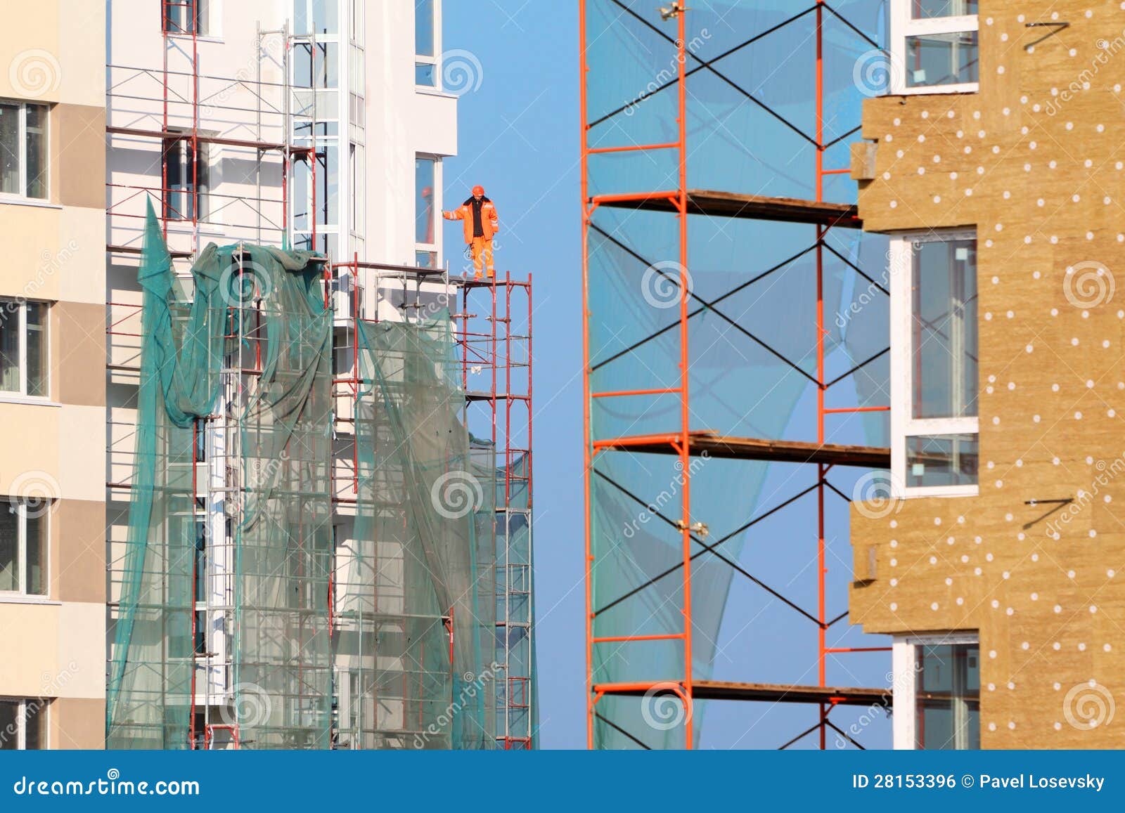 Worker Stands on Scaffolding of High-rise Building Stock Photo - Image ...