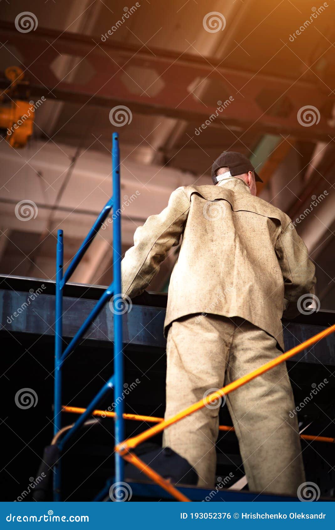 Worker Stands at the Top of Scaffolding Stock Photo - Image of large ...