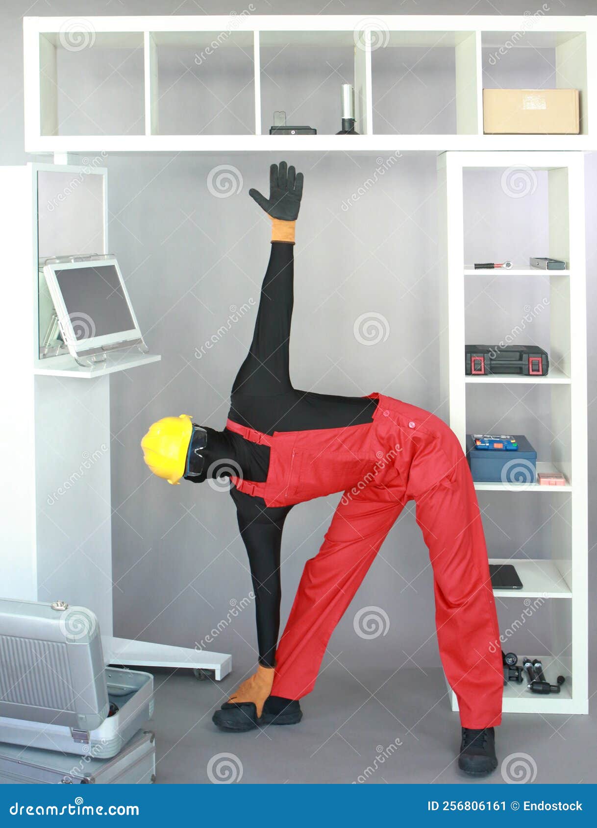 Worker Stretching Back in the Industrial Environment. Stock Image ...
