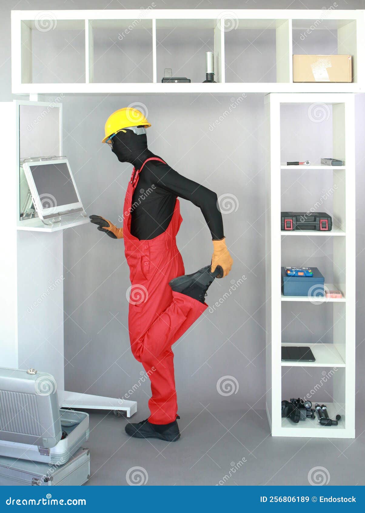 Worker Stretching Leg in the Industrial Environment. Stock Image ...