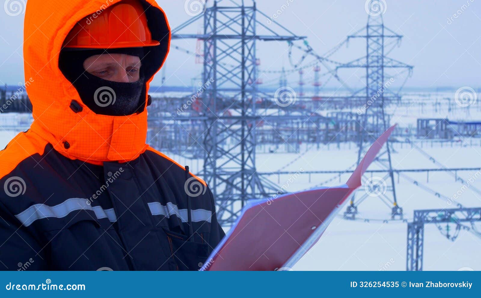 Worker at Substation Checking Documents. Winter Conditions Highlight ...