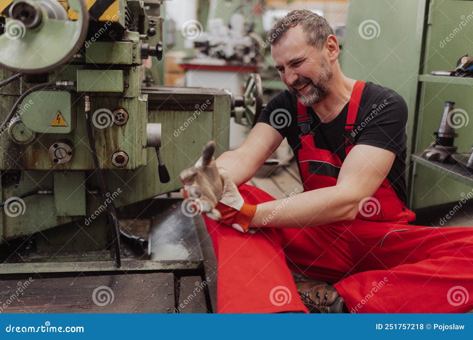 Worker Suffering from Pain after Accident in Factory. First Aid Support ...