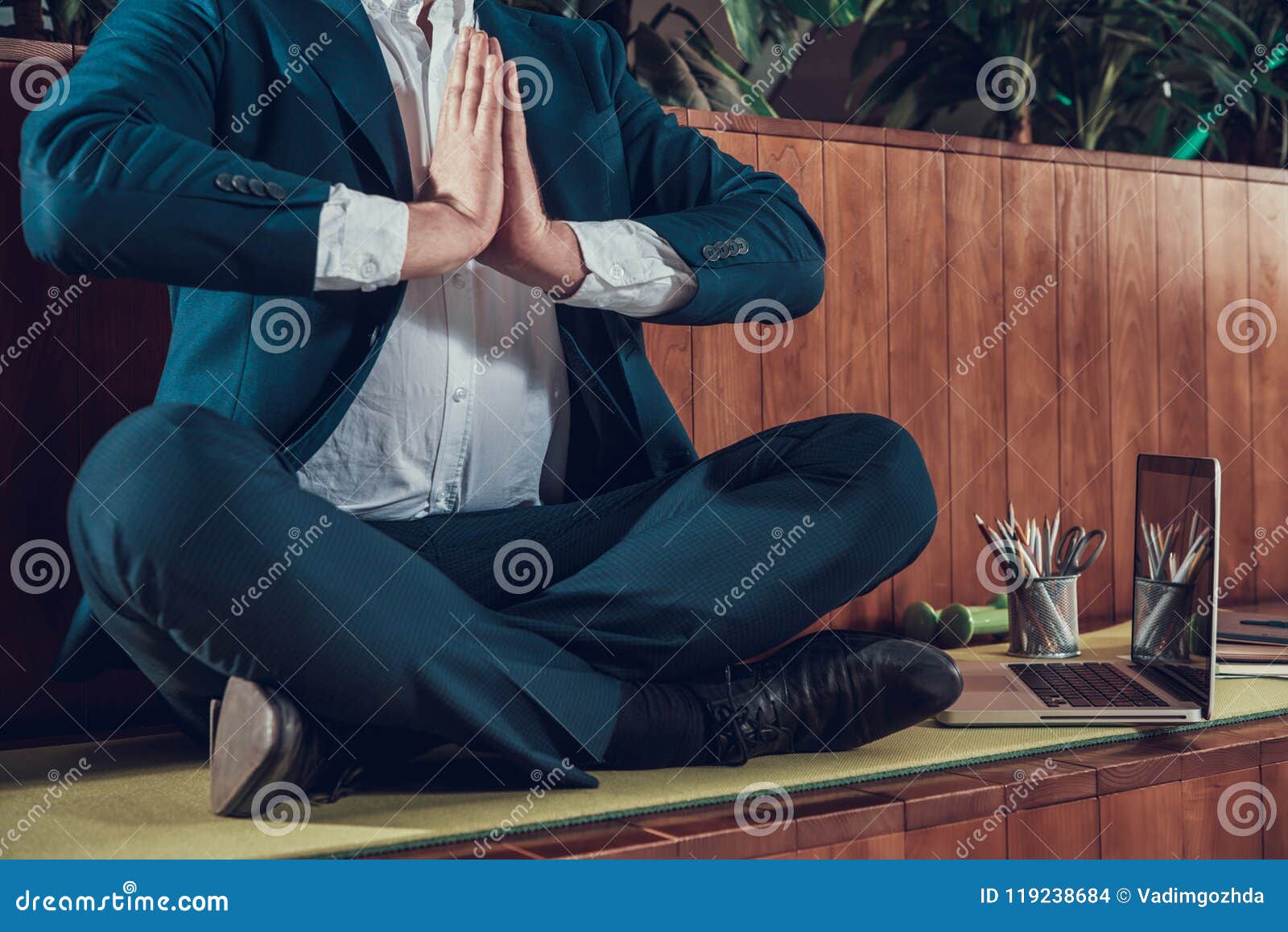 Worker Meditating on Bench in Office. Stock Photo - Image of lifestyle ...