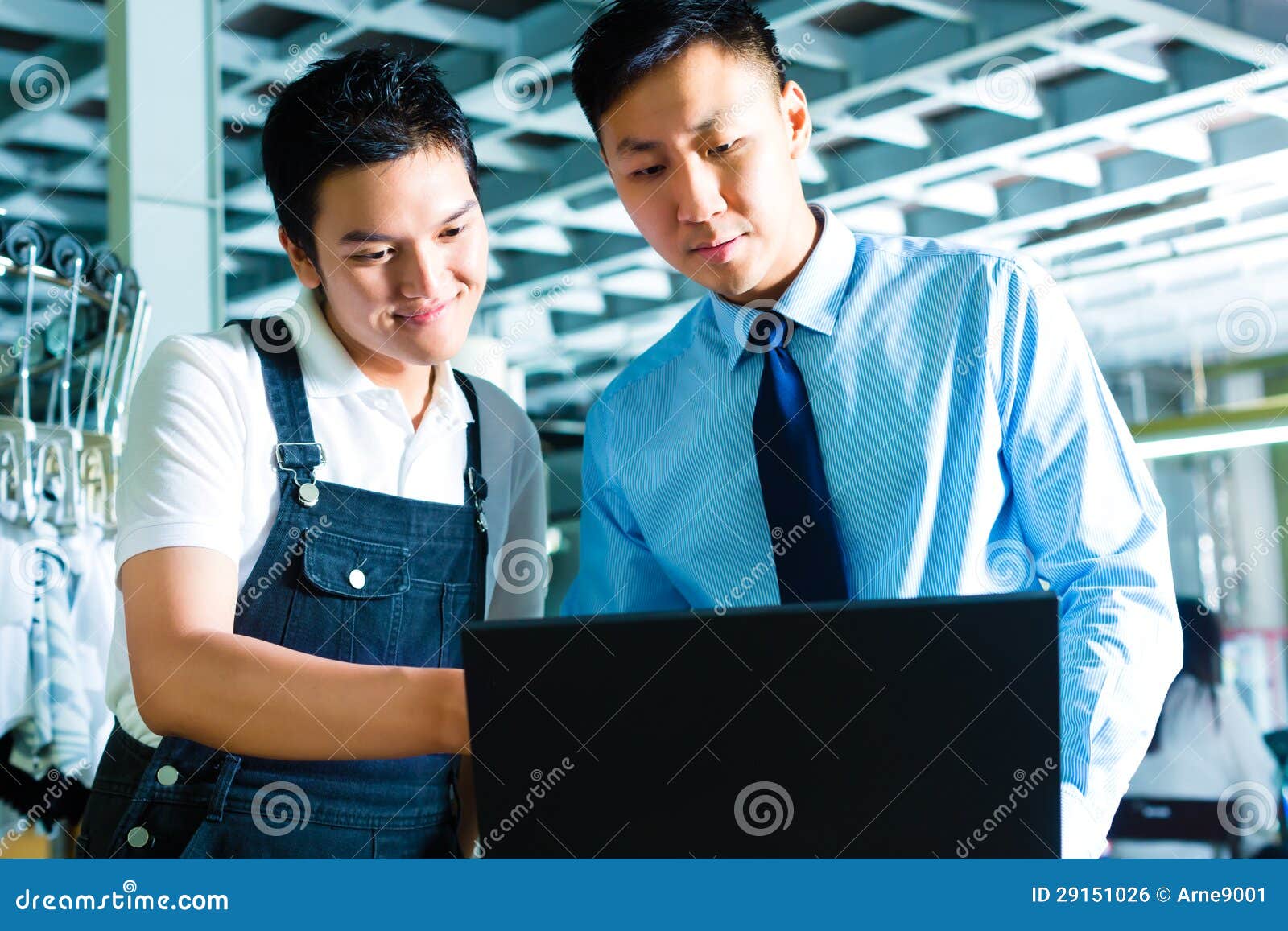 Worker and Supervisor with Laptop in a Factory Stock Photo - Image of ...