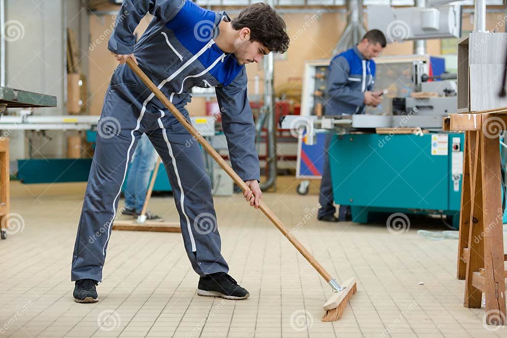Worker Sweeping Dirt on Workshop Stock Image - Image of working, object ...