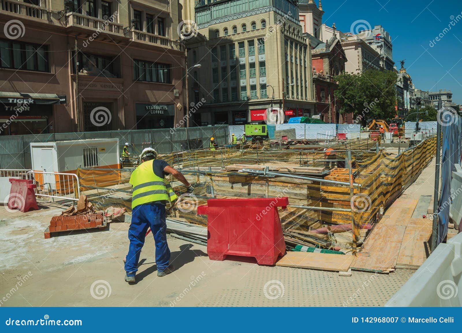 Worker Sweeping the Floor on Construction Site in Madrid Editorial ...