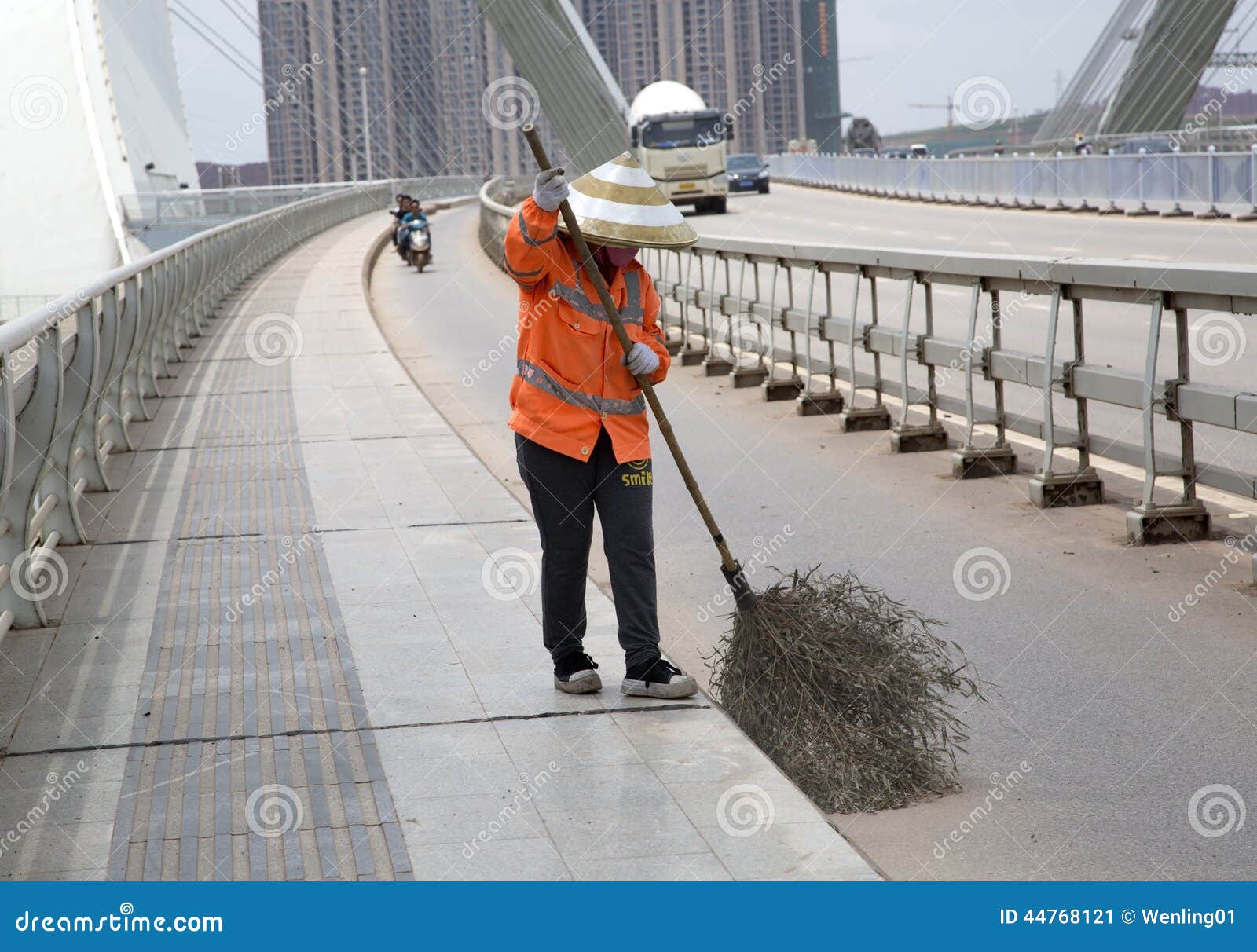 Worker sweeping the street editorial photo. Image of sunny - 44768121