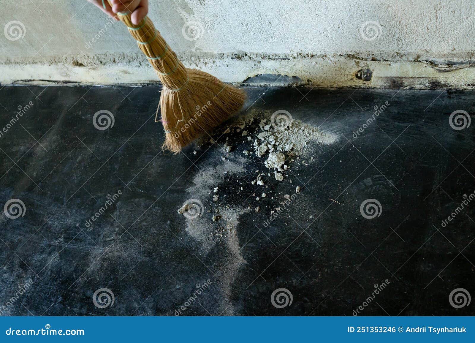 Worker Sweeps Construction Debris with a Broom. Stock Photo - Image of ...