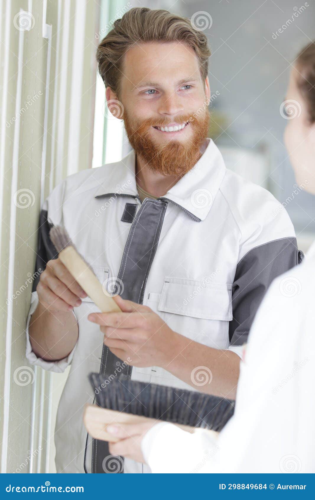 Worker talking and smiling stock photo. Image of person - 298849684