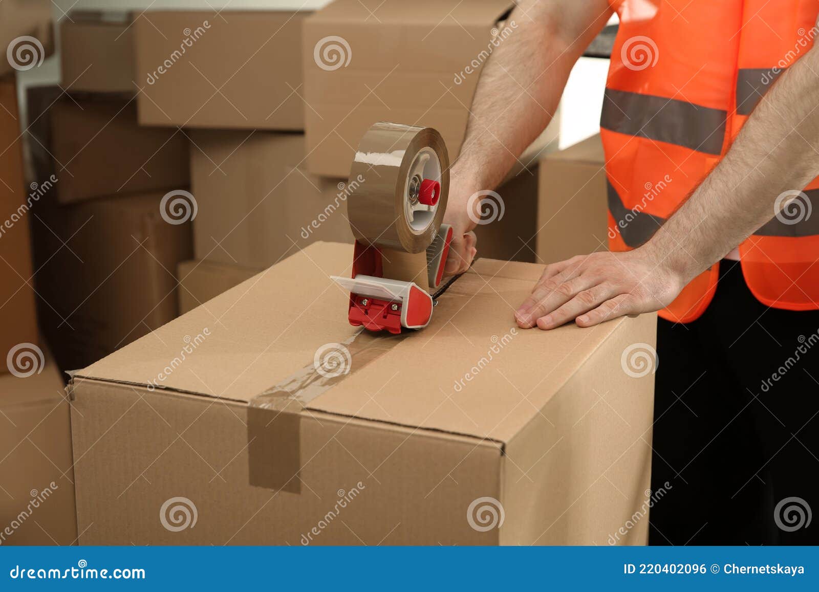 Worker Taping Cardboard Box, Closeup View Stock Photo - Image of ...