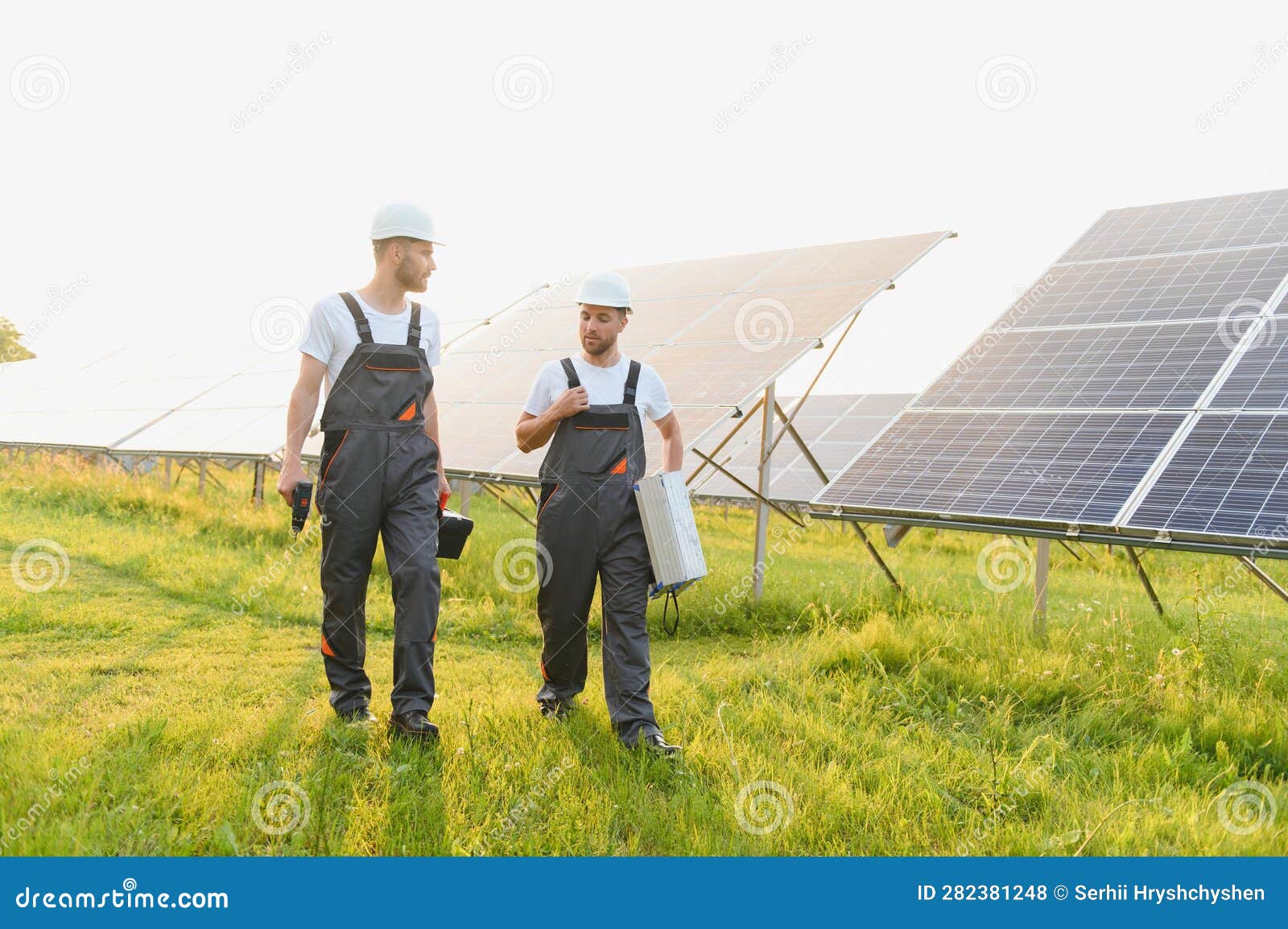 Worker Team with Solar Panel. Worker Team Has Success Install Solar ...