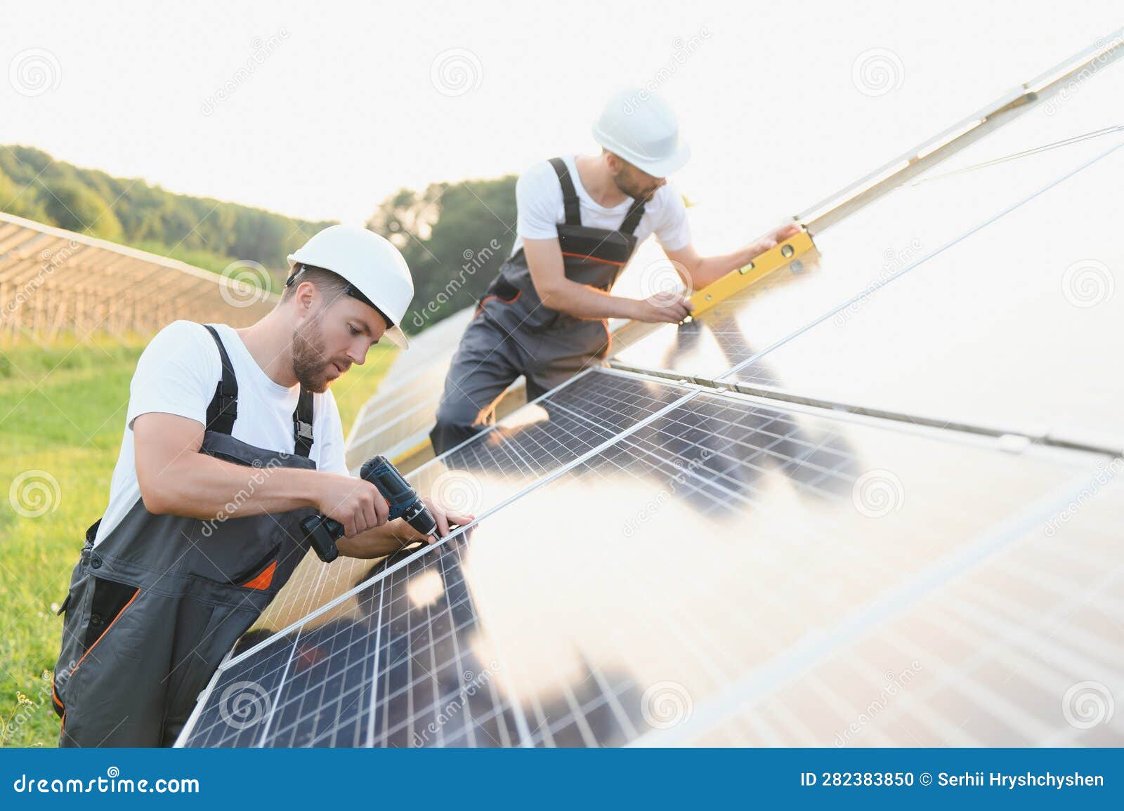 Worker Team with Solar Panel. Worker Team Has Success Install Solar ...