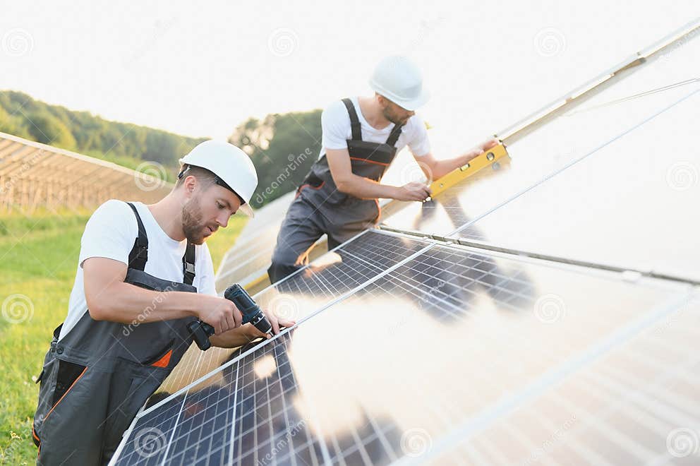 Worker Team with Solar Panel. Worker Team Has Success Install Solar ...