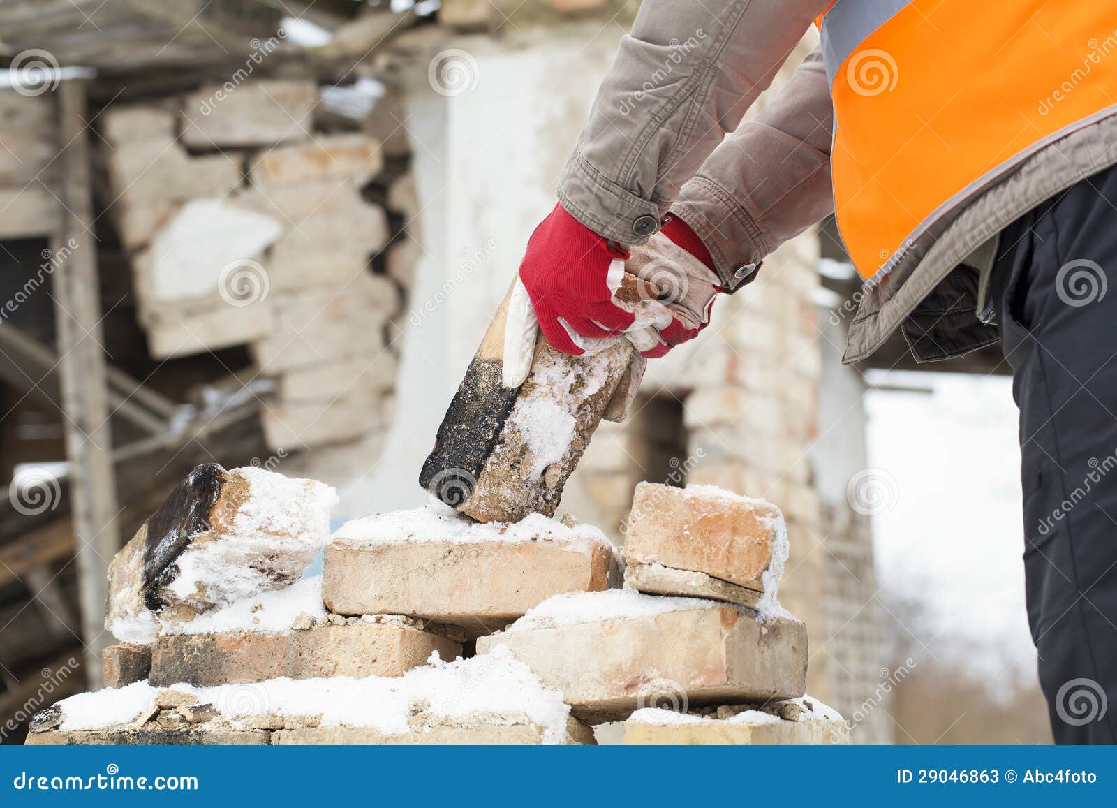 Worker throws bricks stock image. Image of destruction - 29046863