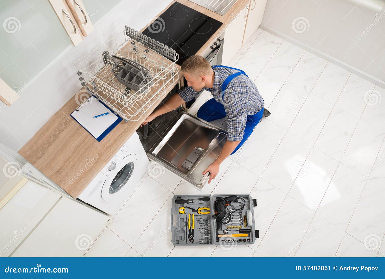 Worker with Toolbox Repairing Dishwasher Stock Image - Image of holding ...