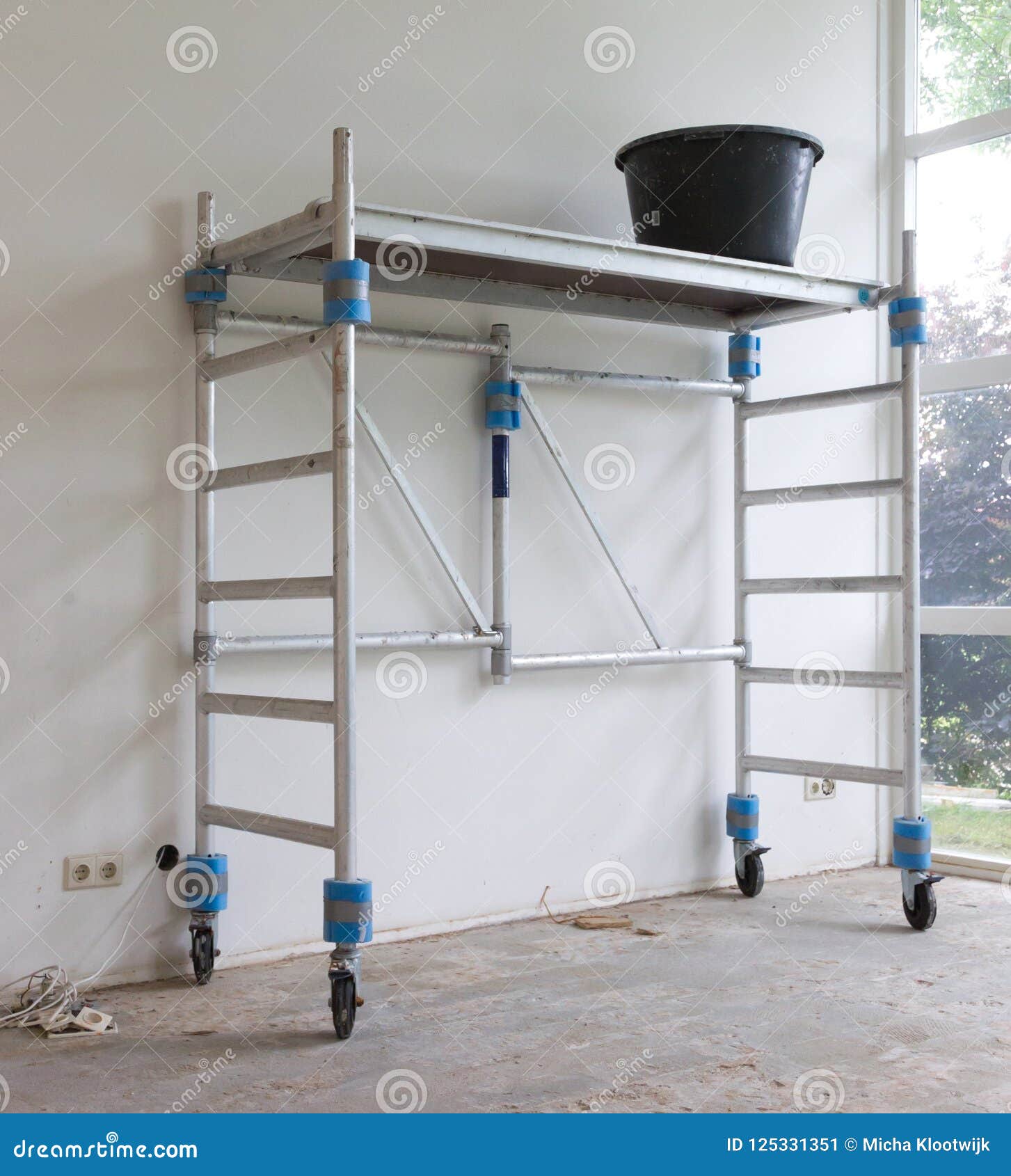 Worker Tools - Bucket Standing on Rolling Scaffolding Stock Image ...