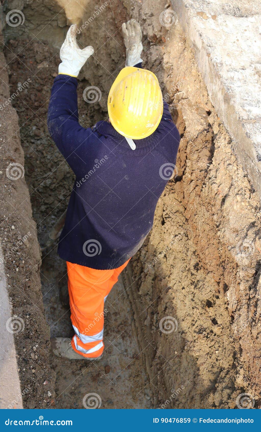 Worker in the trench stock image. Image of construction - 90476859