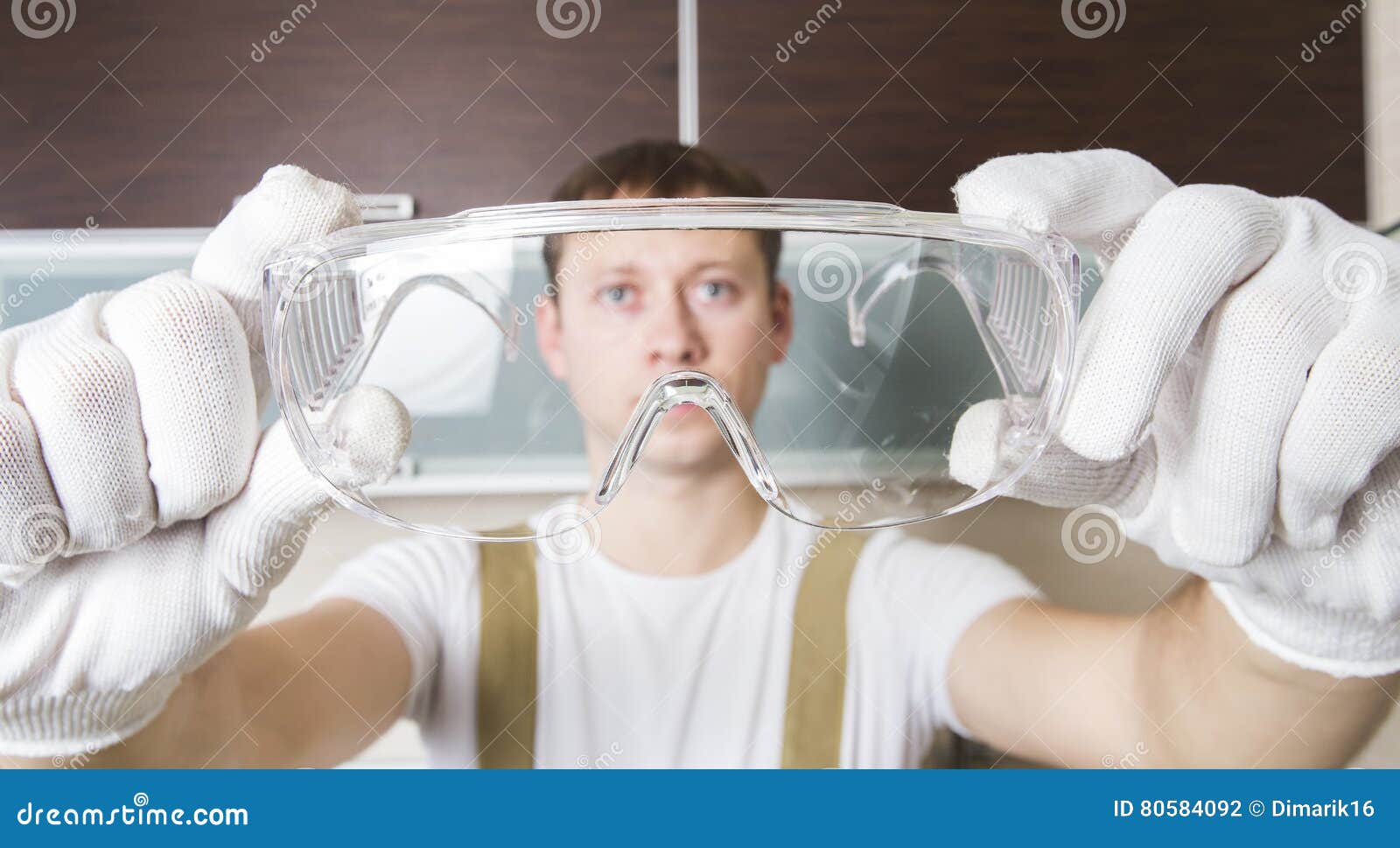 Worker Trying on Safety Glasses Stock Photo - Image of laboratory ...