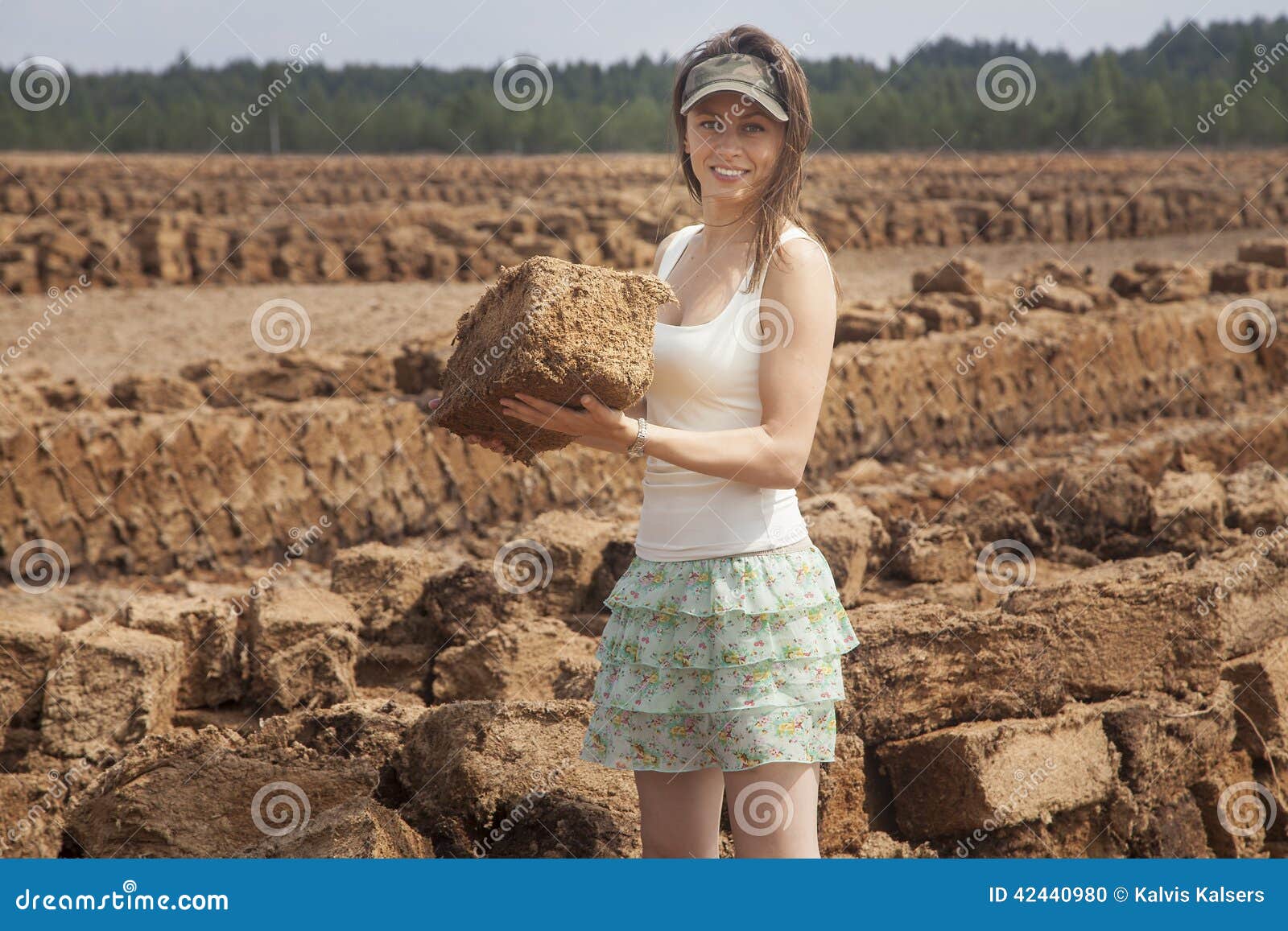 Worker at peat field stock photo. Image of field, holding - 42440980