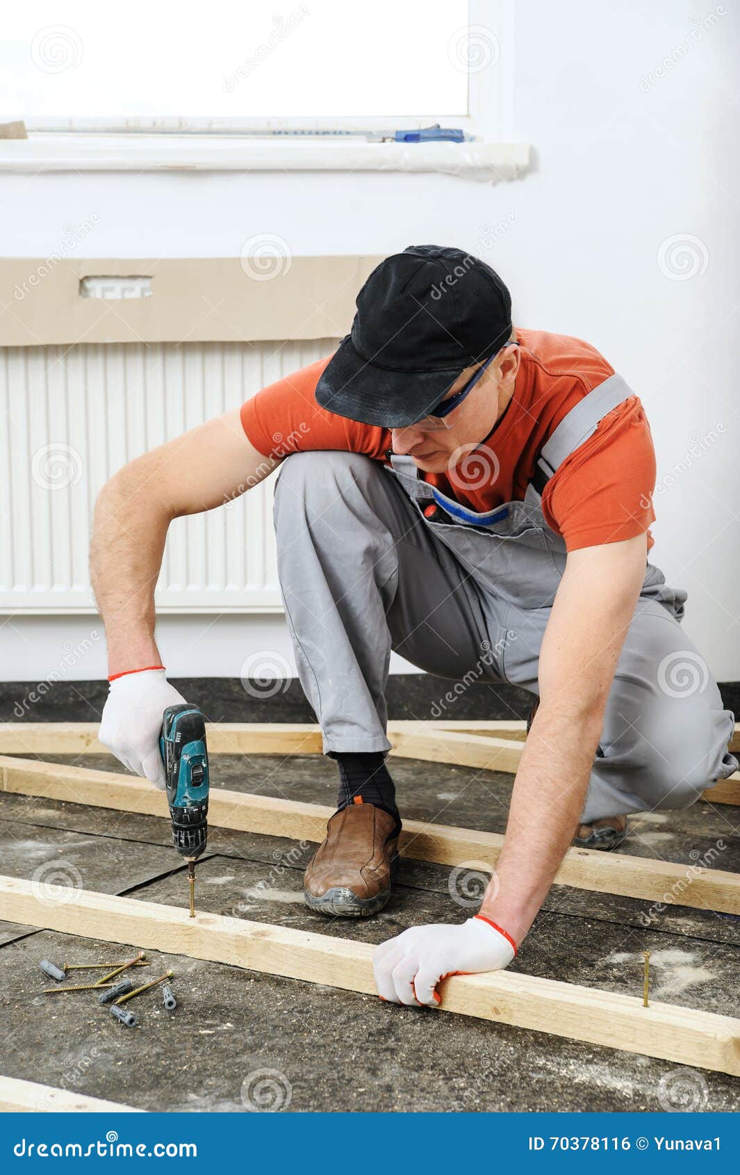 Worker twists the screw. stock photo. Image of repairing - 70378116