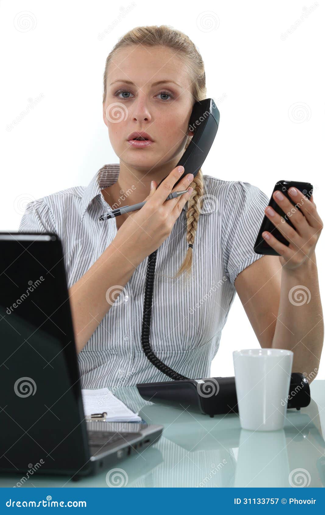 Worker with two phones stock image. Image of emotion - 31133757