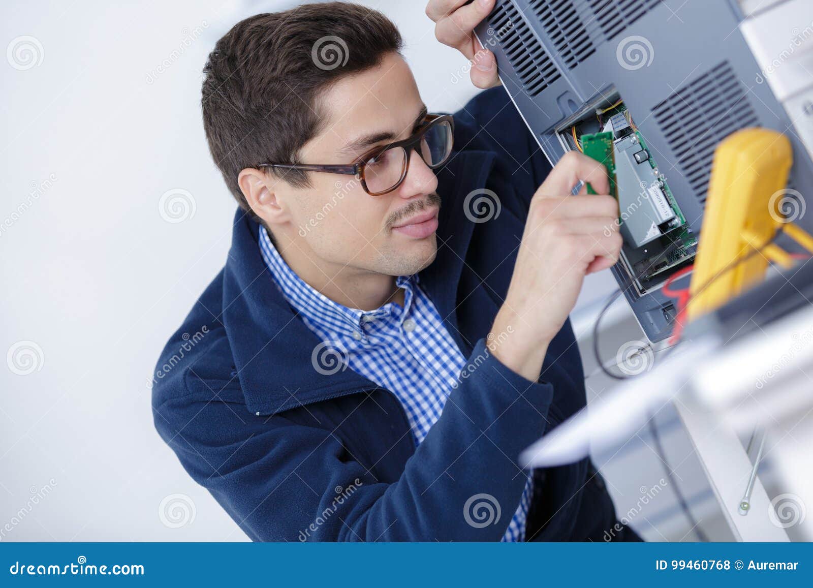 Worker in Uniform Checking Quality Processed Tool Stock Photo - Image ...