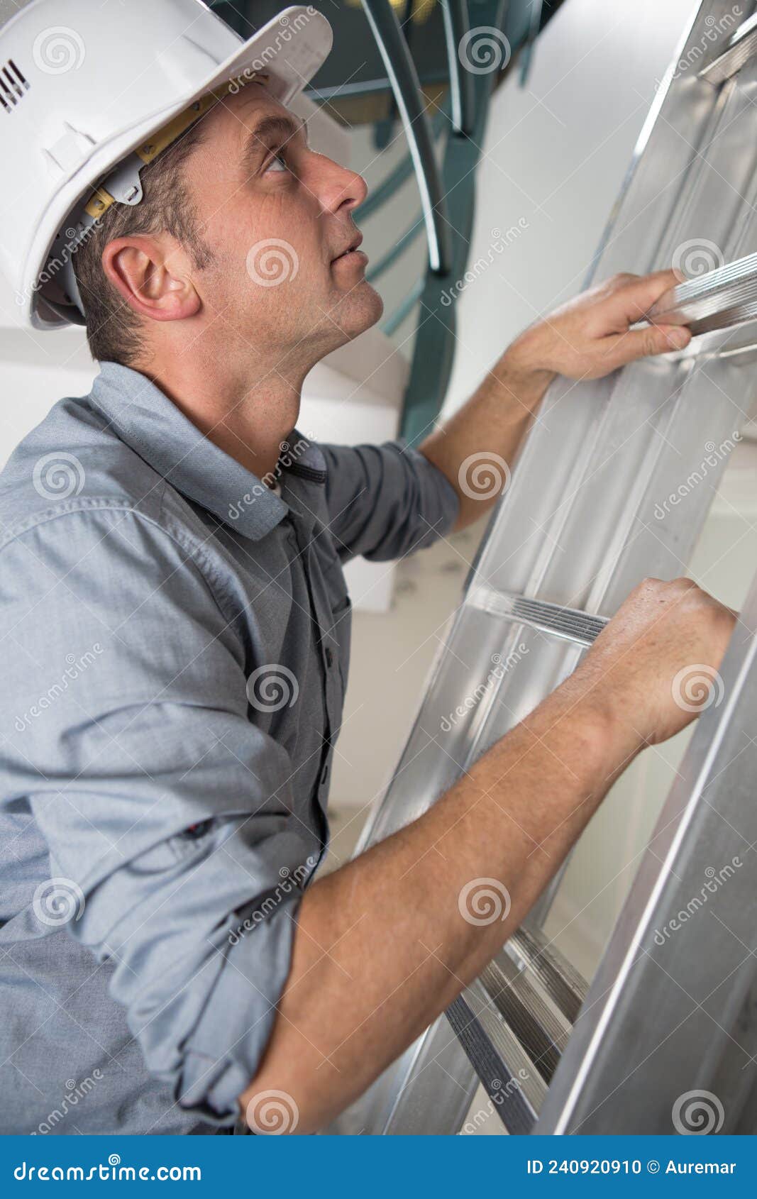 Worker in Uniform Going Up Ladder Stock Photo - Image of closeup ...