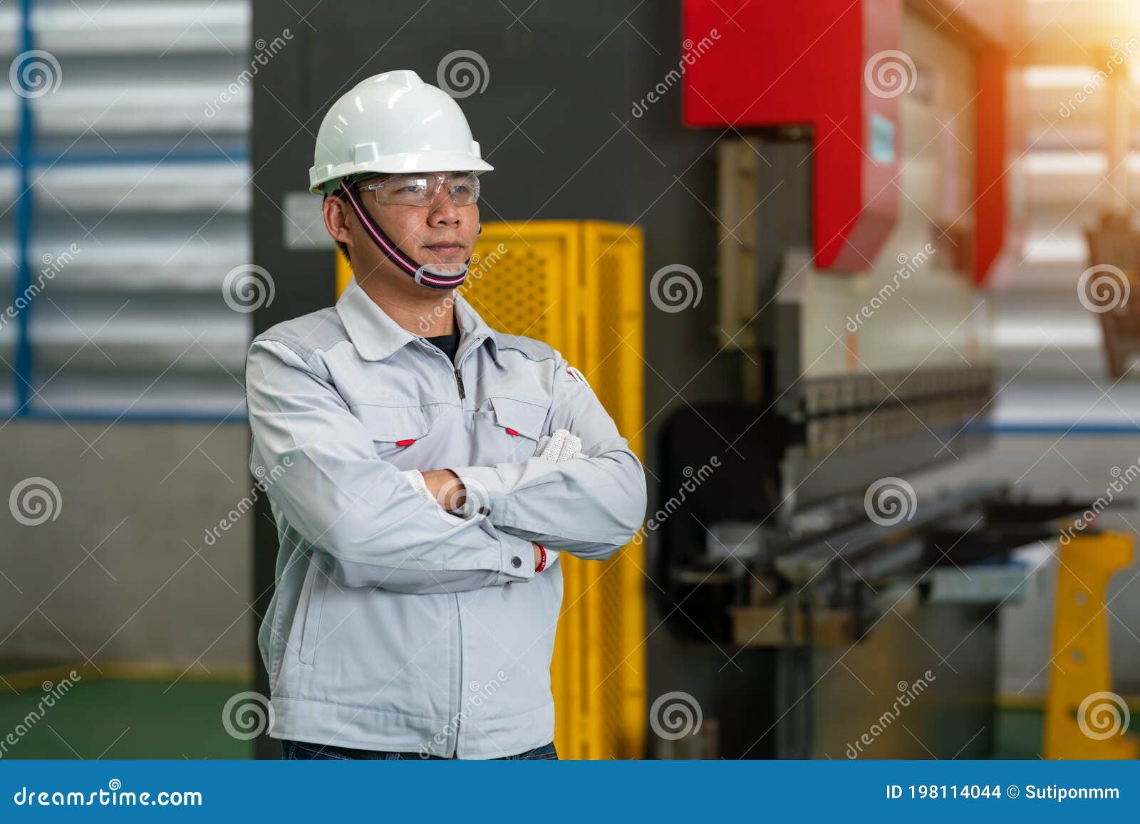 The Worker in the Uniform Machine Factory Stock Photo - Image of ...