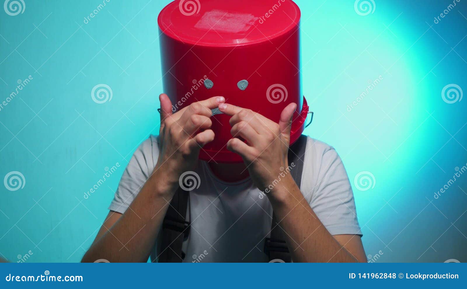 Worker in Uniform with Red Bucket on His Head Sad Stock Footage - Video ...