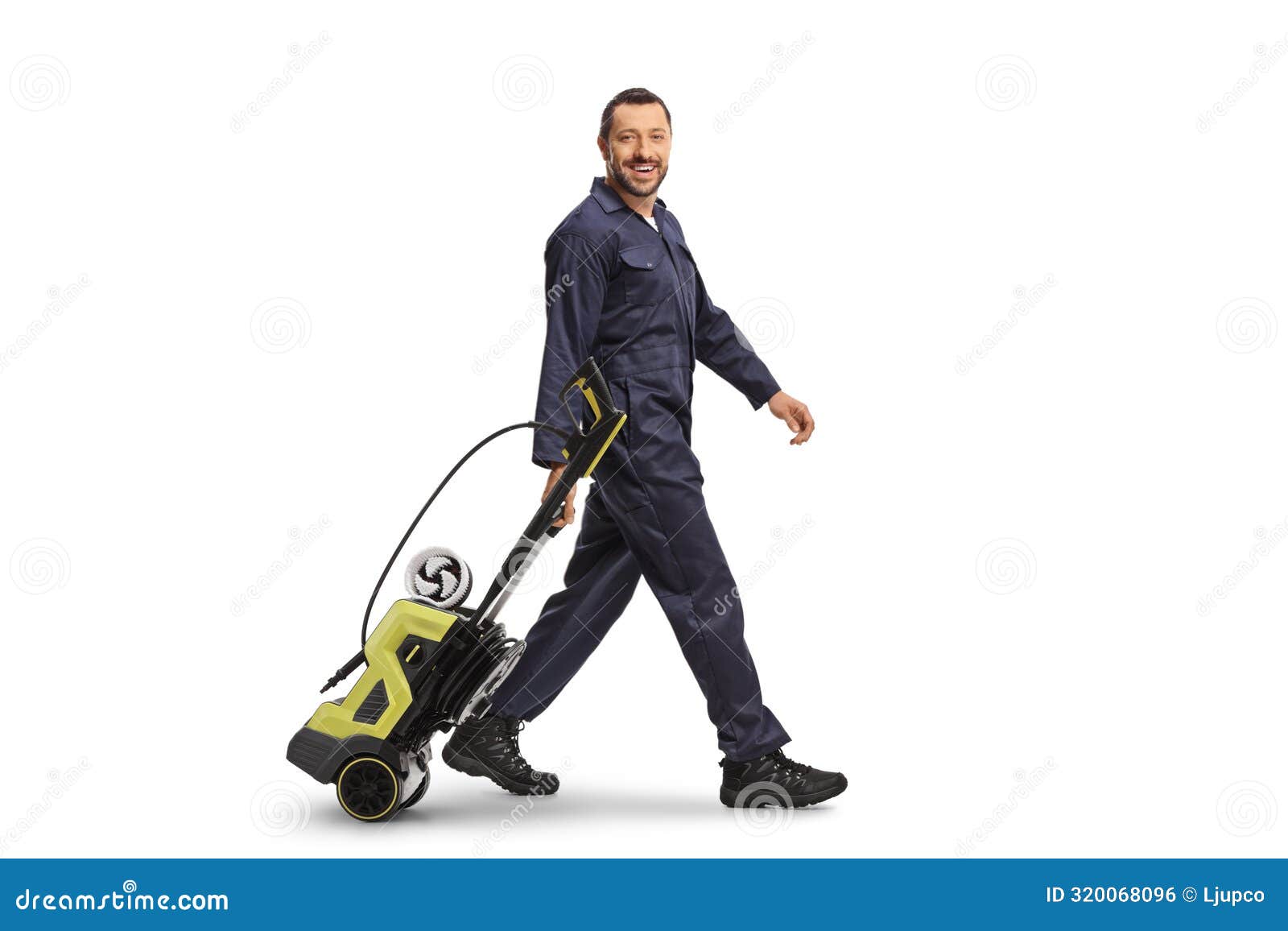 Worker in a Uniform Walking with a High Pressure Washer Machine Stock ...
