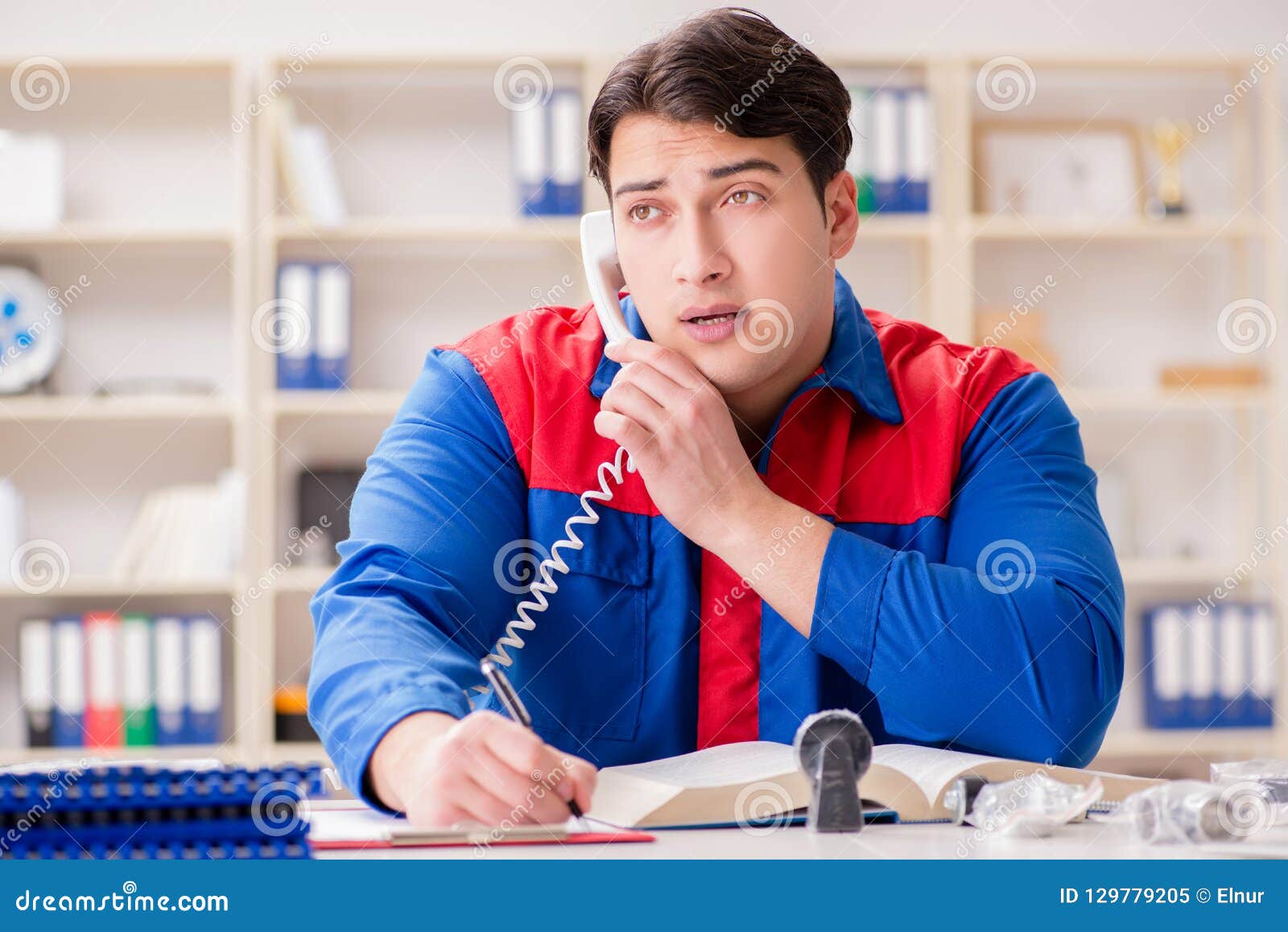 The Worker in Uniform Working on Project Stock Image - Image of detail ...