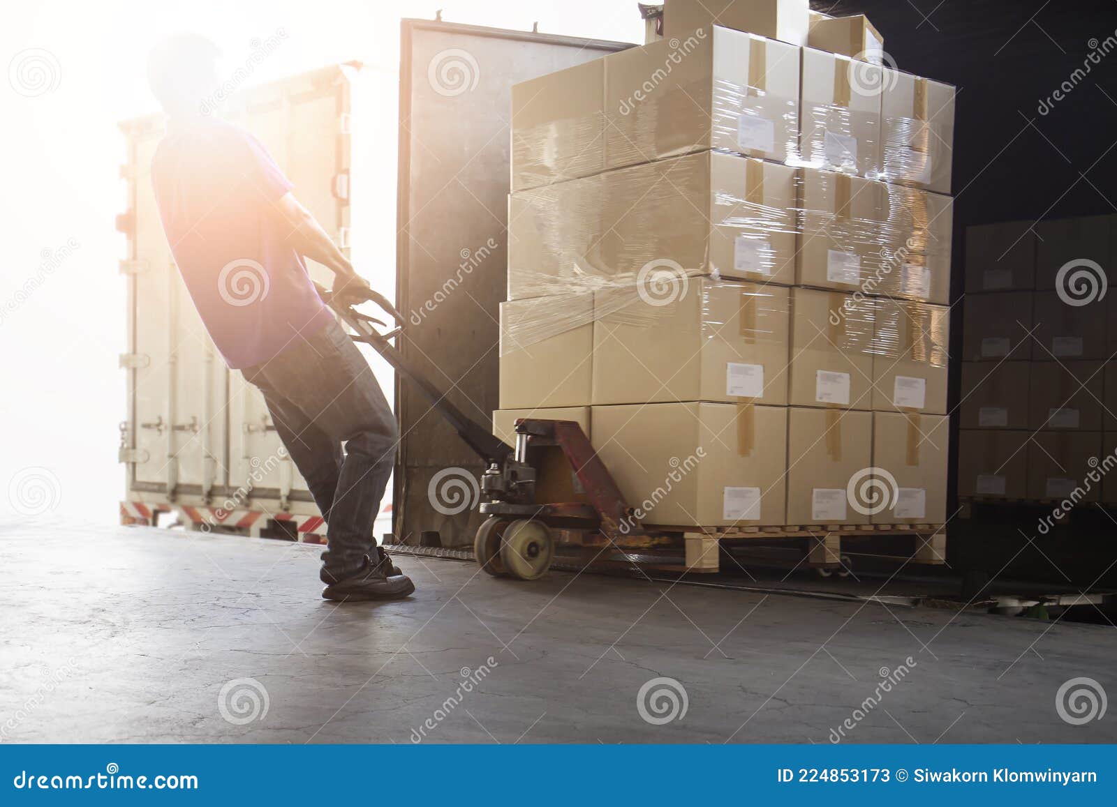 Worker Unloading Package Box Out of the Inside Cargo Container ...