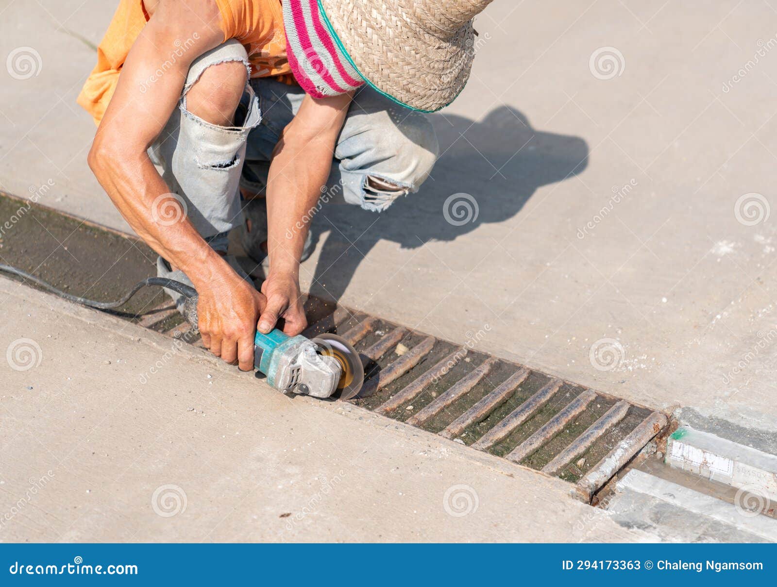Worker Use Grinder Cutting Iron Grate of a Drainage System Stock Image ...