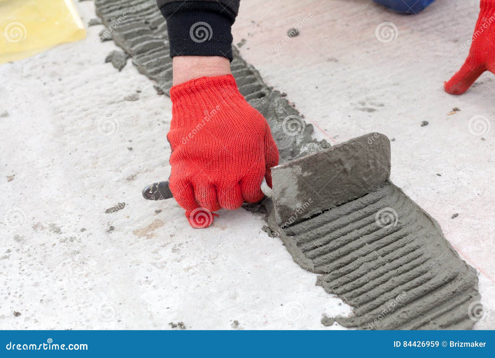 Worker Use Spatula for Plastering a Floor. Stock Image - Image of ...