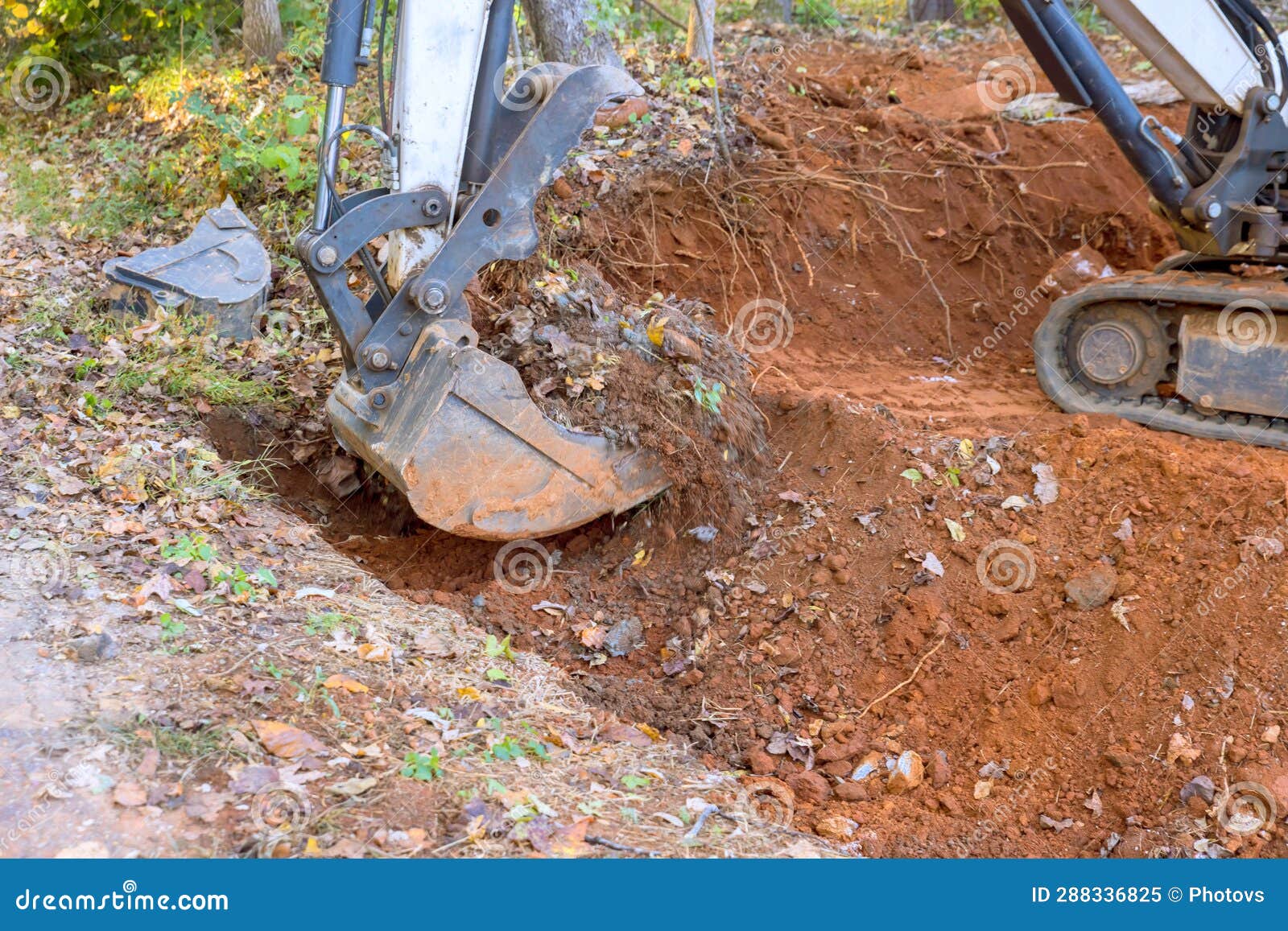 Worker Use Tractor Digs Out a Ditch for Laying Drainage Concrete Sewage ...