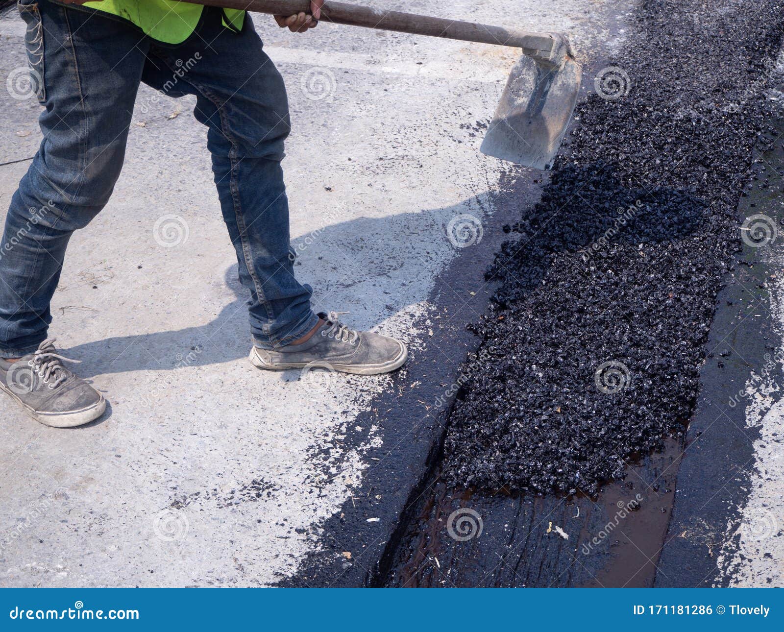 Worker In Use Vibratory Plate Compactor For Path Construction. Plate ...