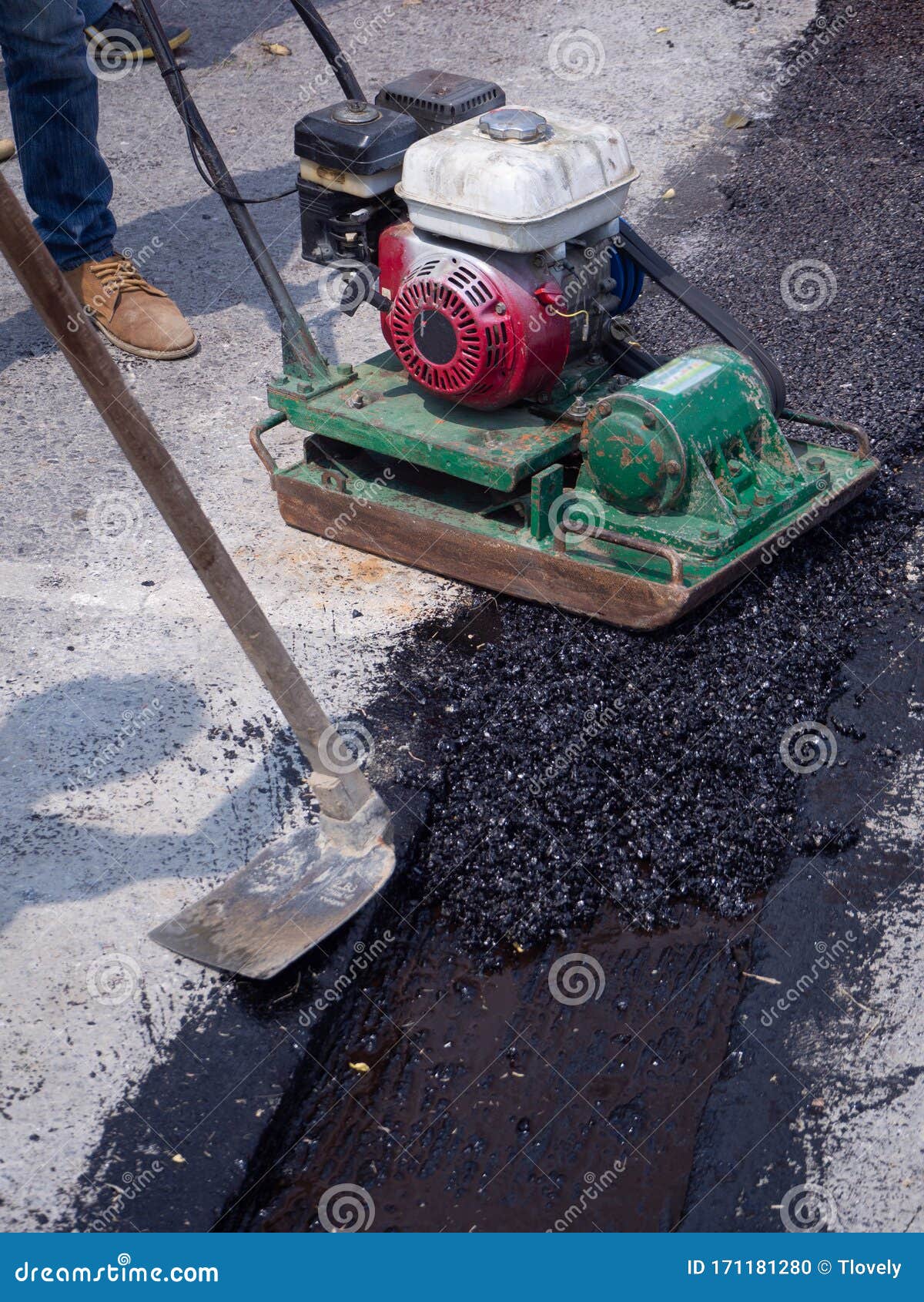Worker Use Vibratory Plate Compactor Compacting Asphalt at Road Stock ...
