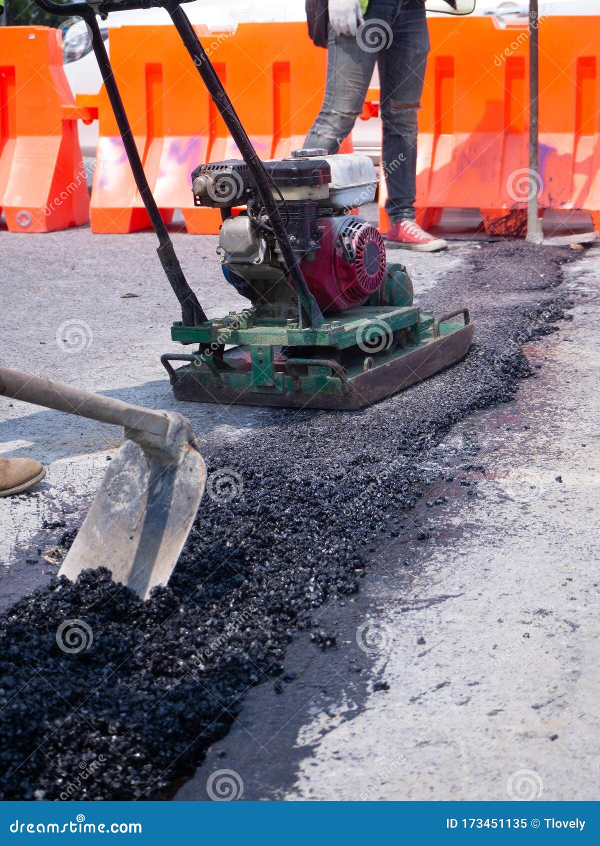 Worker Use Vibratory Plate Compactor Compacting Asphalt at Road Stock ...