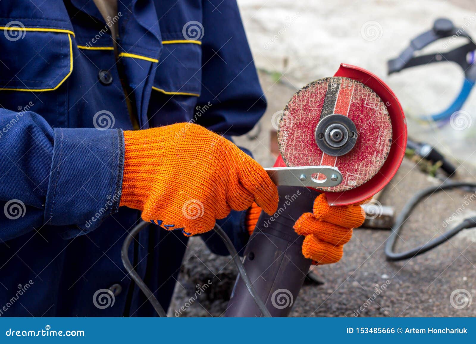Worker Uses Angle Drive Grinder for Work. How in Angle Drive Grinder ...