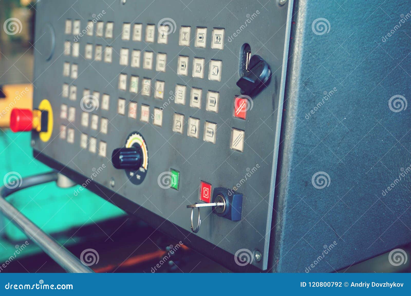 The Worker Uses the Control Panel of the CNC Machine To Process the ...