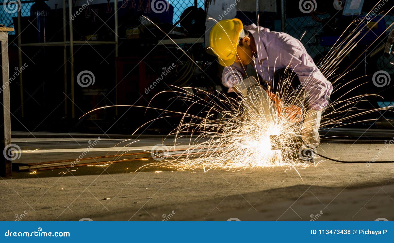 Worker Uses Grinding Cut Metal, Focus on Flash Light Line of Sharp ...