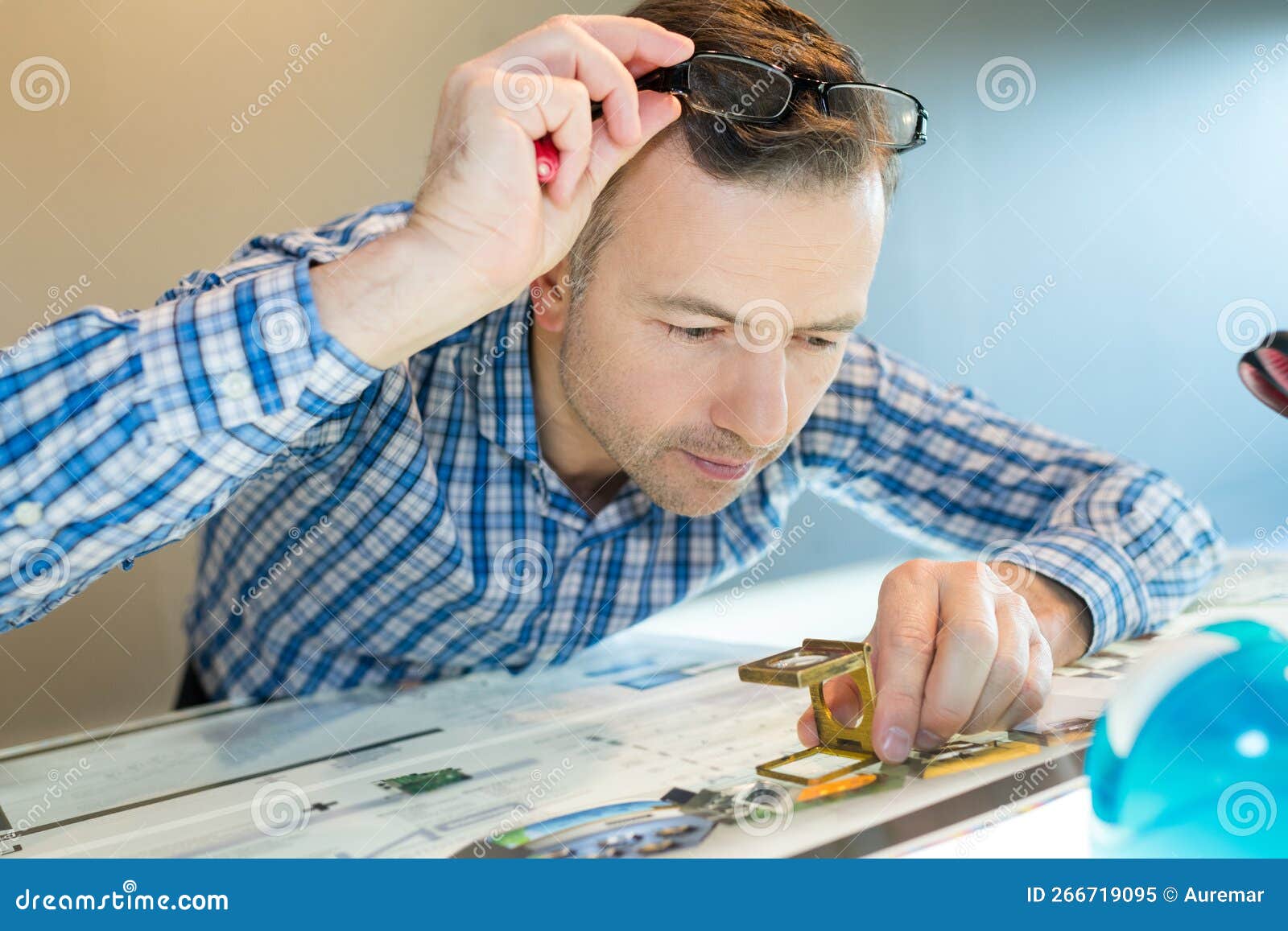 Worker Uses Magnifying Glass at Printer Stock Image - Image of reading ...